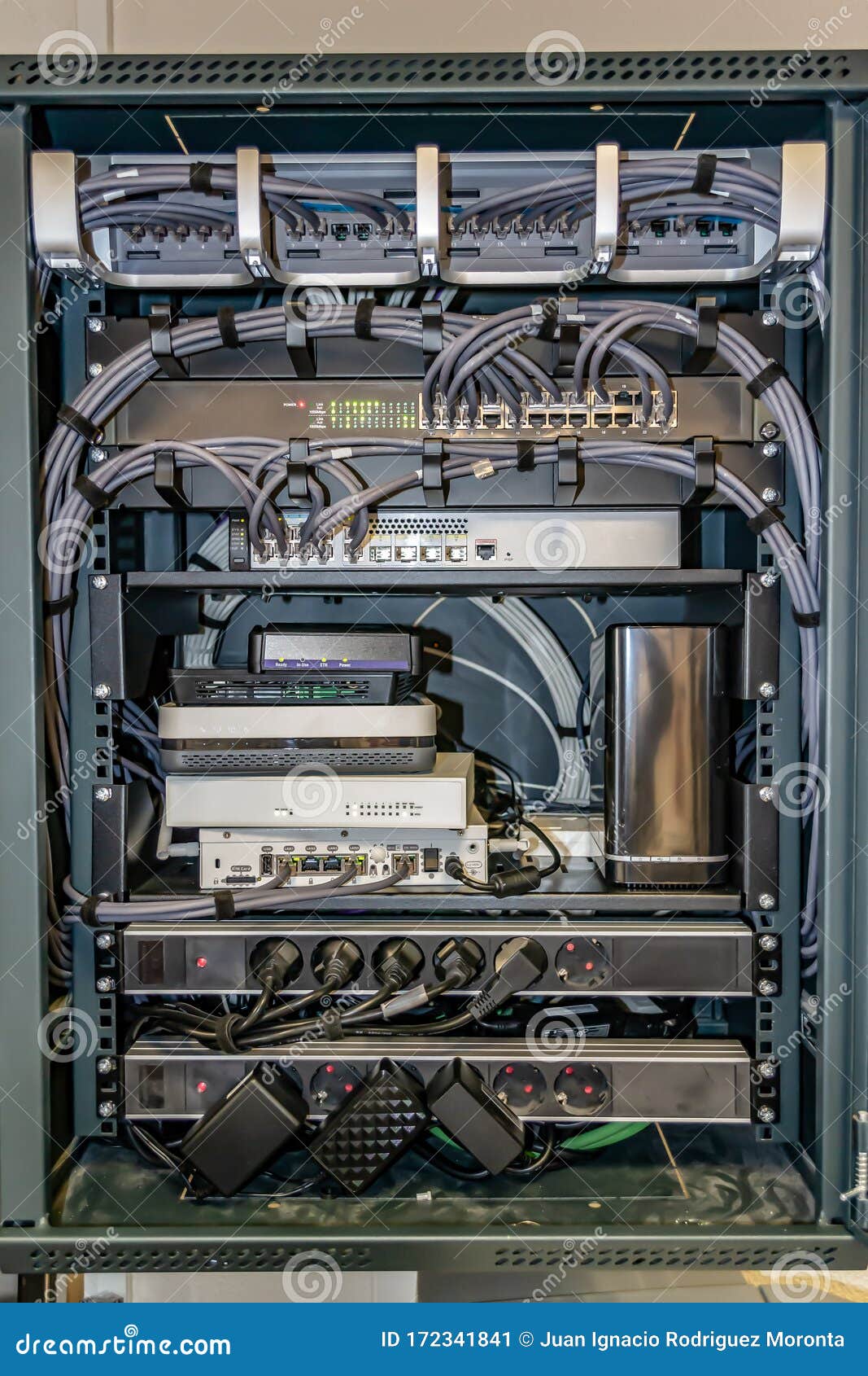 Network Server Rack with Colored Cables and Ethernet Switches in the ...
