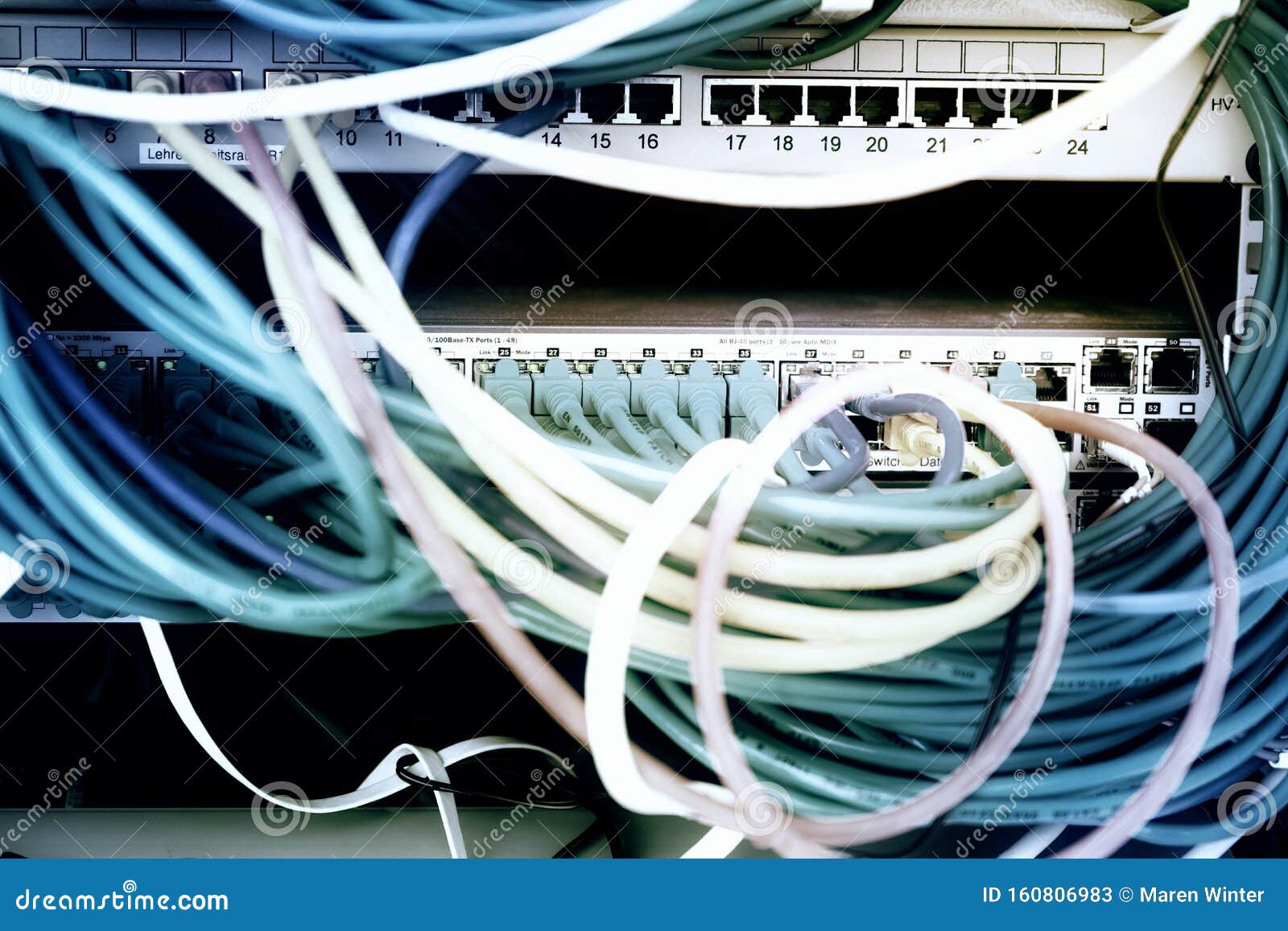 Network Server Rack with Colorful Cables and Ethernet Switches in the ...