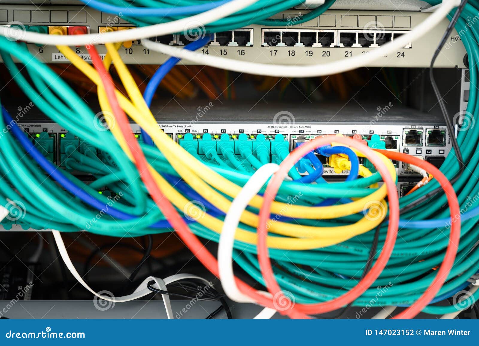 Network Server Rack with Colorful Cables and Ethernet Switches in the ...