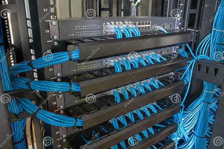 Network Switch and Ethernet Cables in Rack Cabinet Stock Photo - Image ...