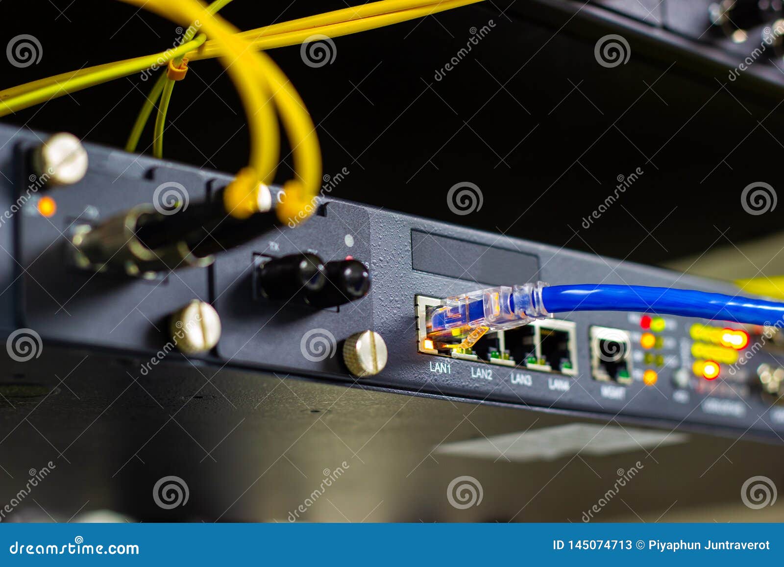 Network Switch in Rack, Network Cables Connect SFP Module Port in the ...