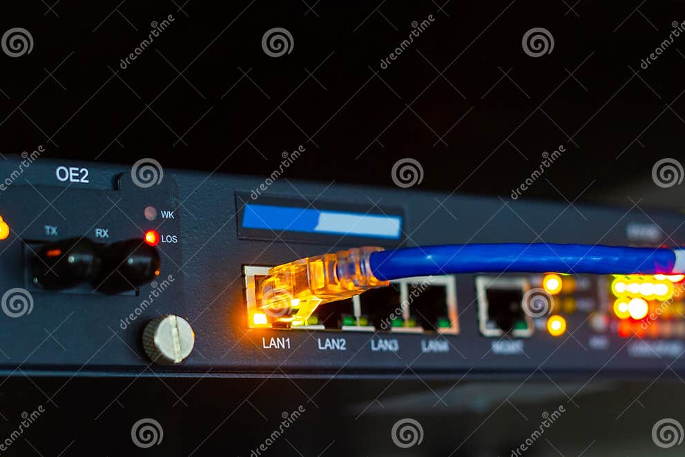 Network Switch in Rack, Network Cables Connect SFP Module Port Stock ...