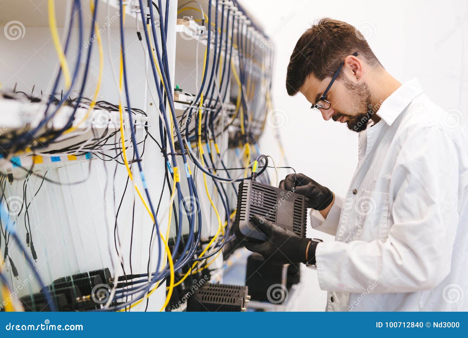 Network Technician Testing Modems Stock Photo - Image of digital ...