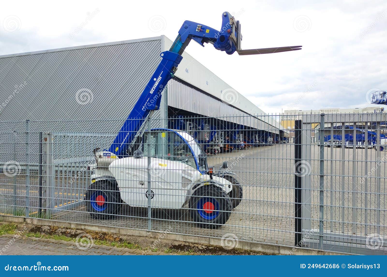 Telescopic Handler Manitou Maniscopic Take Bales From A Truck. Day View ...