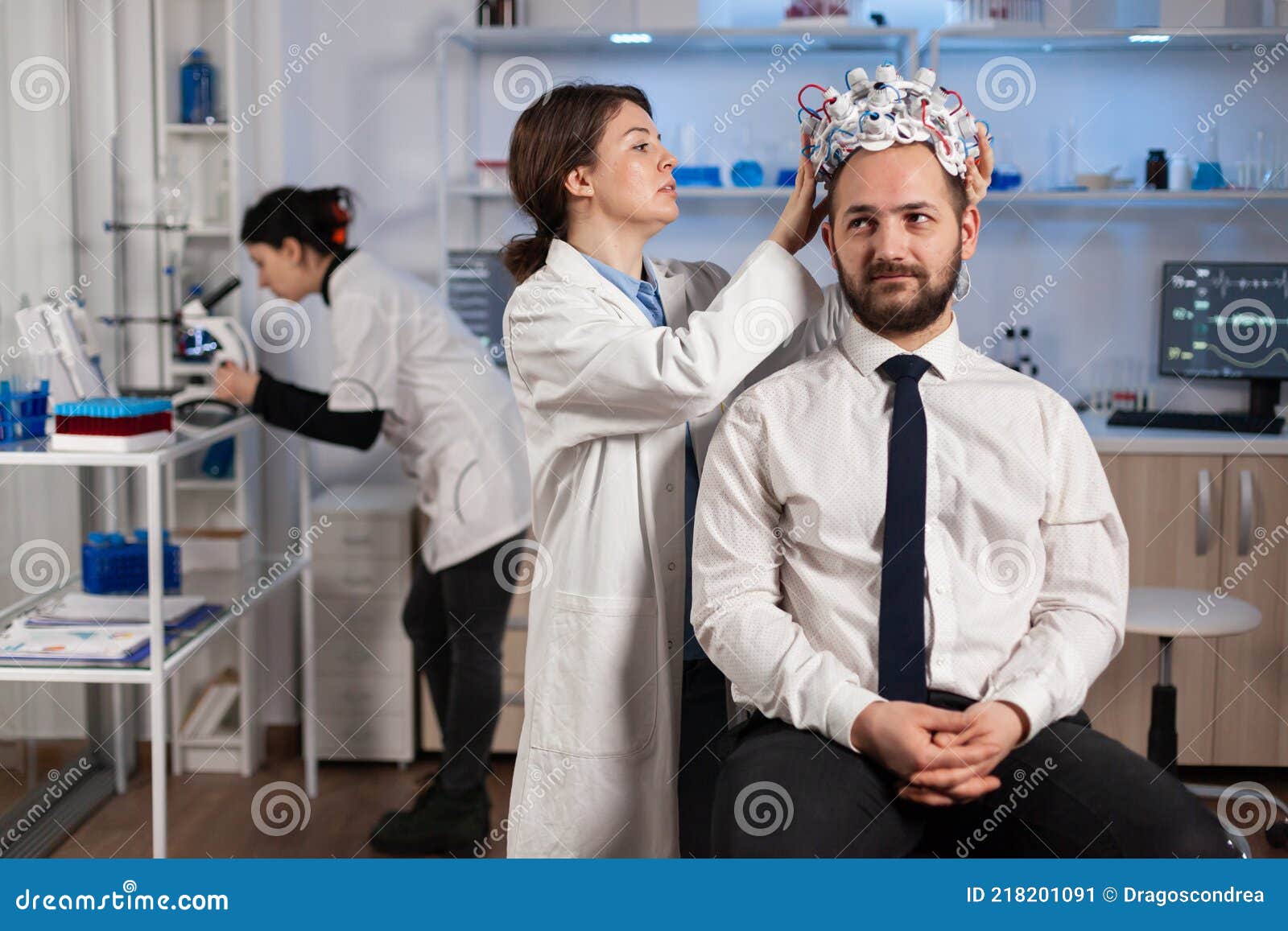Neurologist Doctor Analysing Brain of Man and Nervous System Stock ...