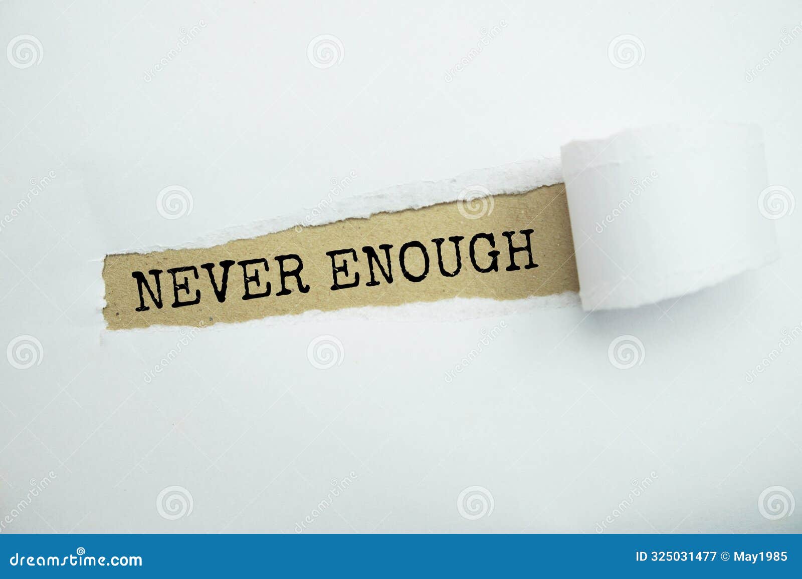 Never Enough Message Written on Craft Paper with Torn Paper Background ...