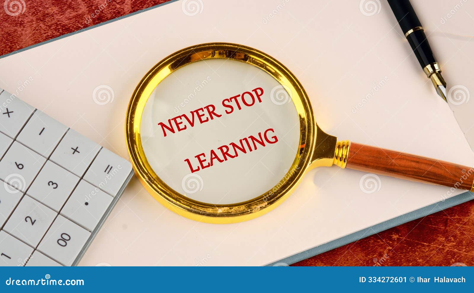 Never Stop Learning Written through a Magnifying Glass in Red Letters ...