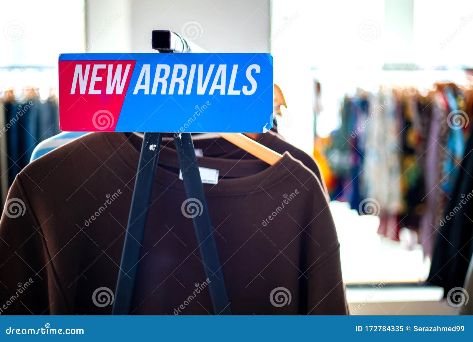 New Arrivals Tag on the Clothes at a Store Stock Image - Image of ...