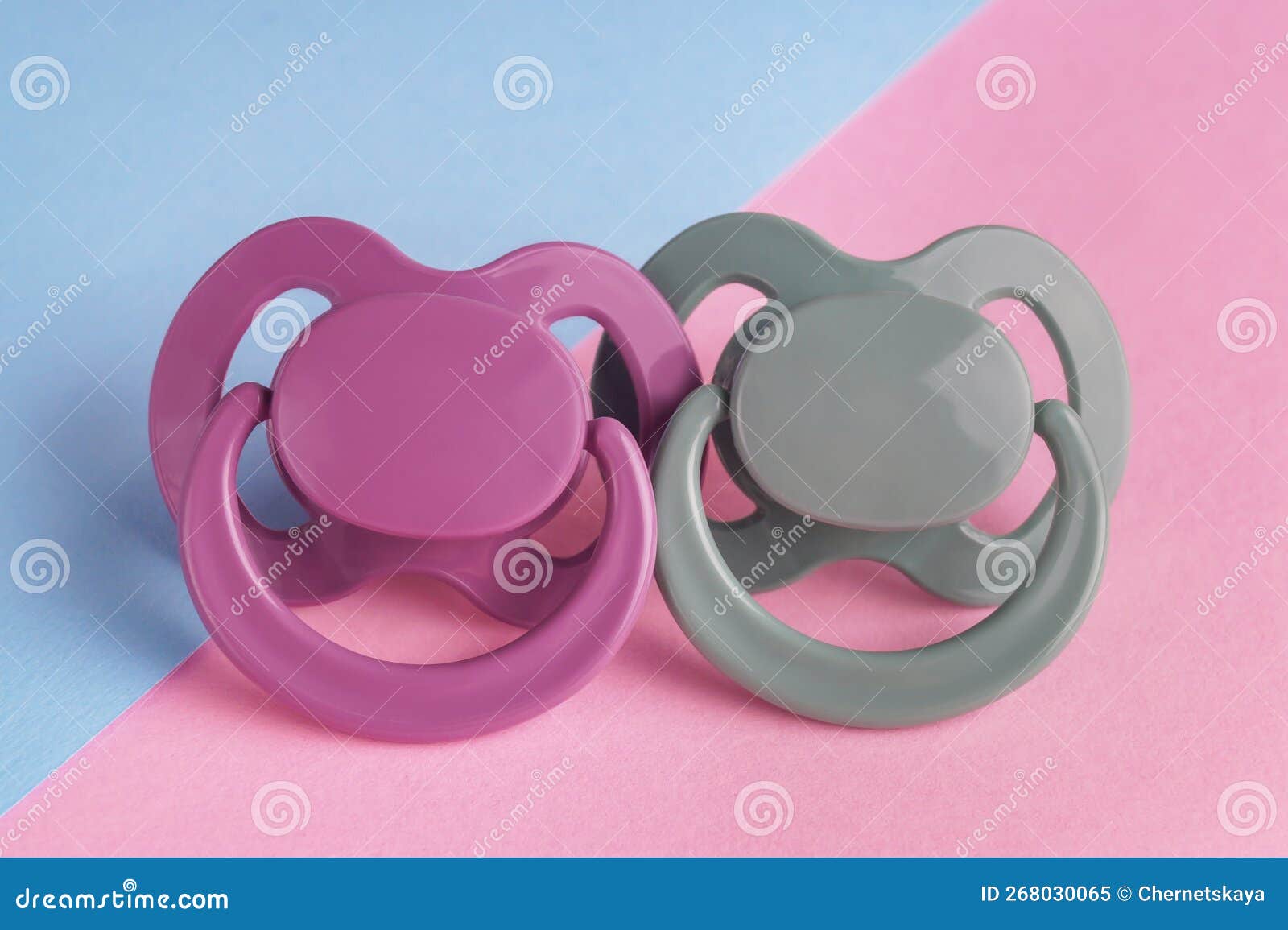 New Baby Pacifiers on Color Background, Closeup Stock Image - Image of ...