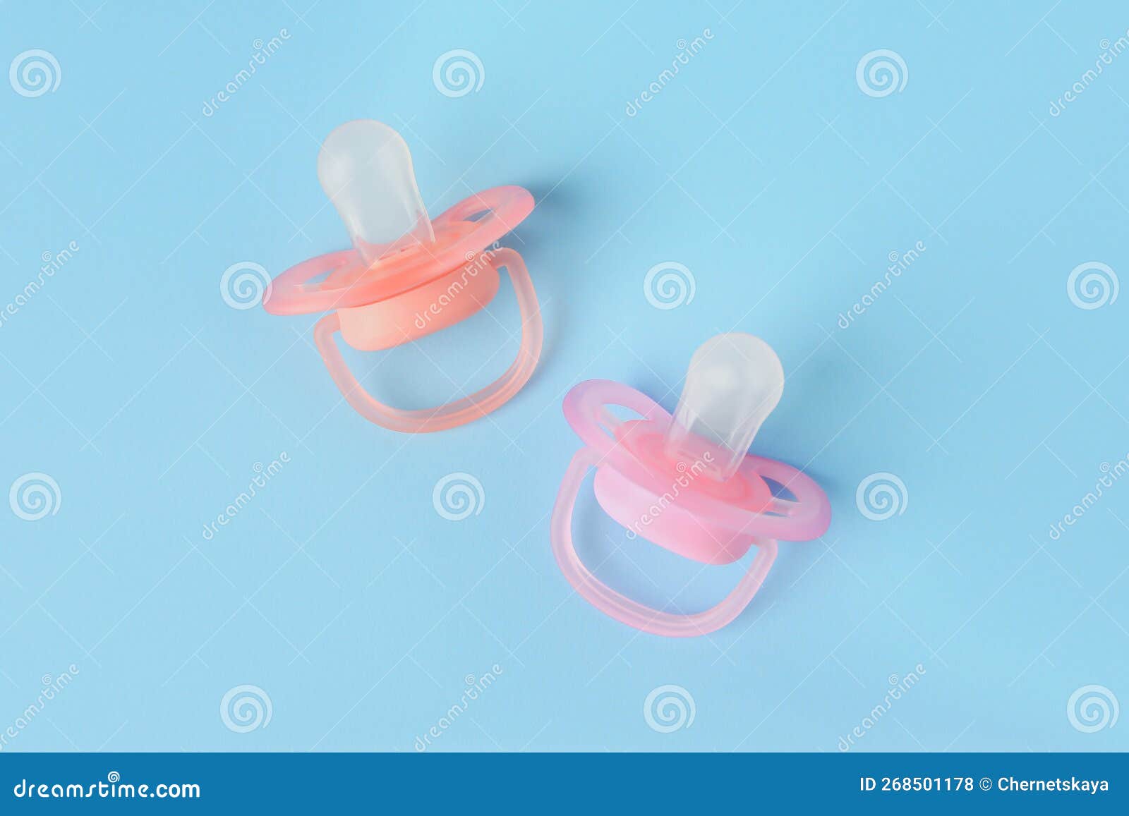 New Baby Pacifiers on Light Blue Background, Flat Lay Stock Photo ...