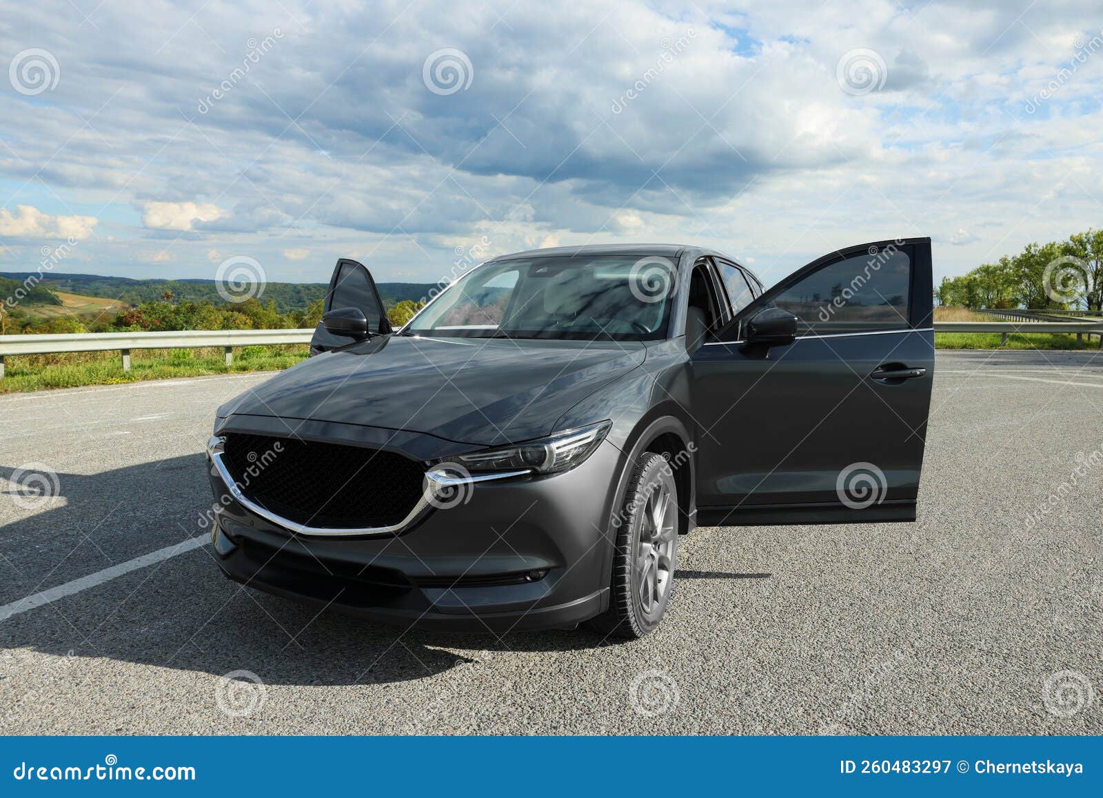New Black Modern Car with Open Doors on Asphalt Road Stock Image ...