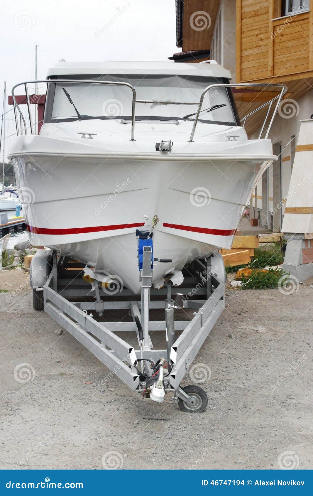 New Boat on a Trailer in a Shipyard Stock Photo - Image of white, shore ...