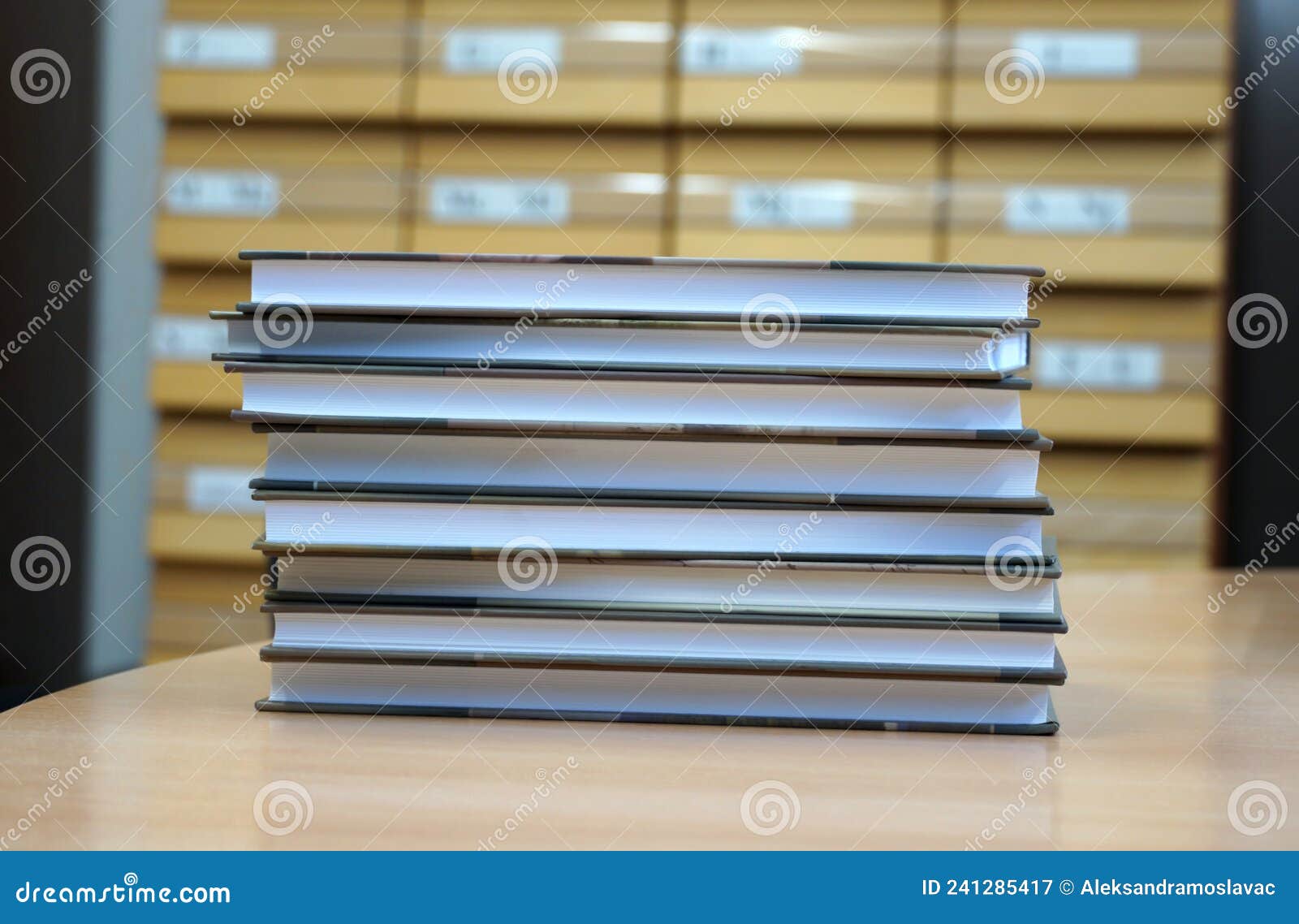 New Books Stacked on the Table Stock Image - Image of horizontal ...