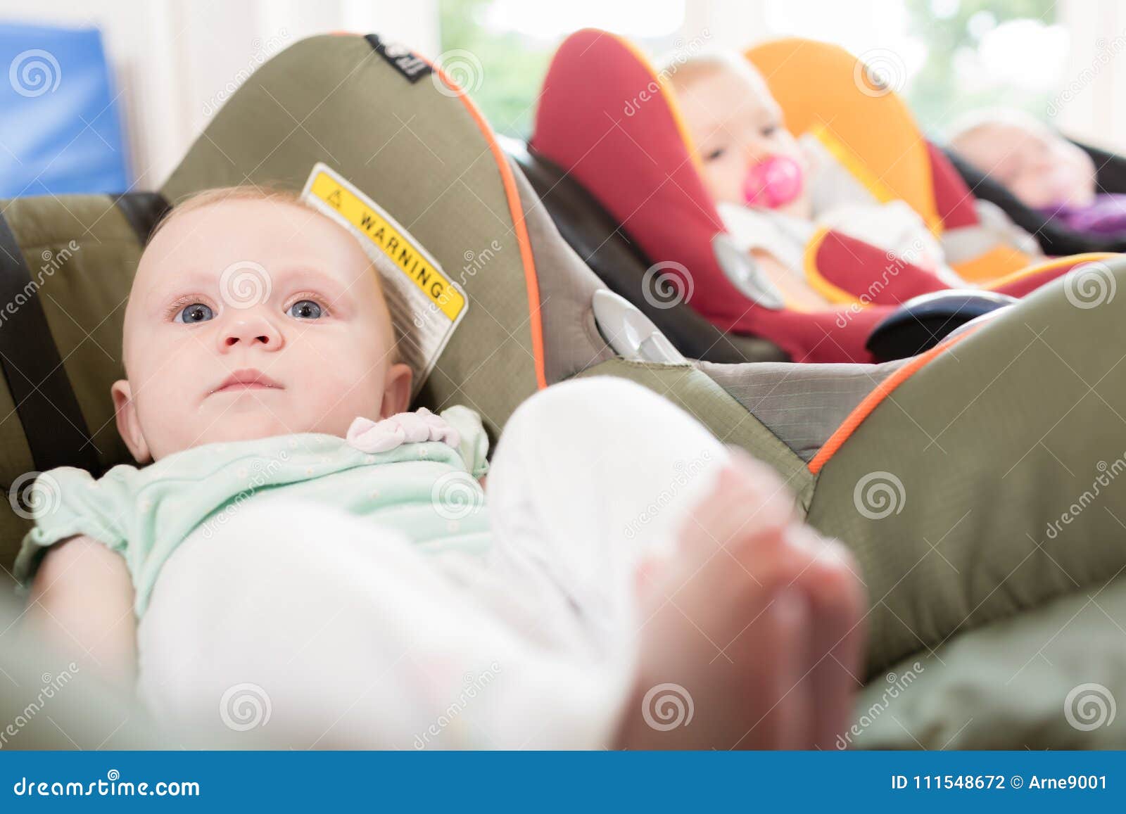 New-born Babies in Toddler Group Lying in Baby Shells Stock Photo ...
