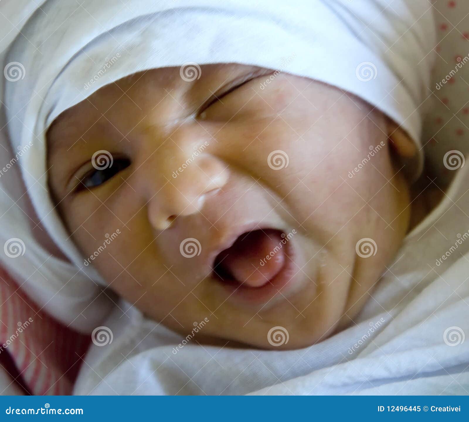 New Born Baby winking stock image. Image of child, closeup - 12496445