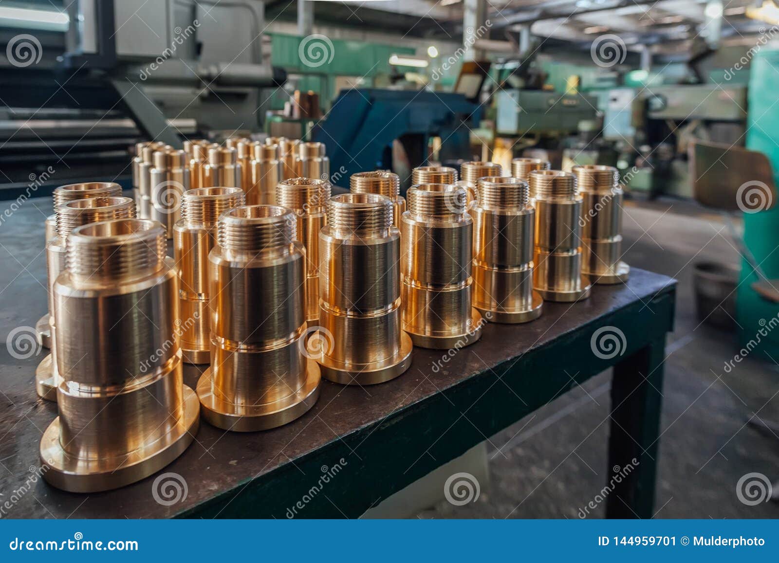 New Brass Threaded Bushings on Table in Factory Stock Image - Image of ...