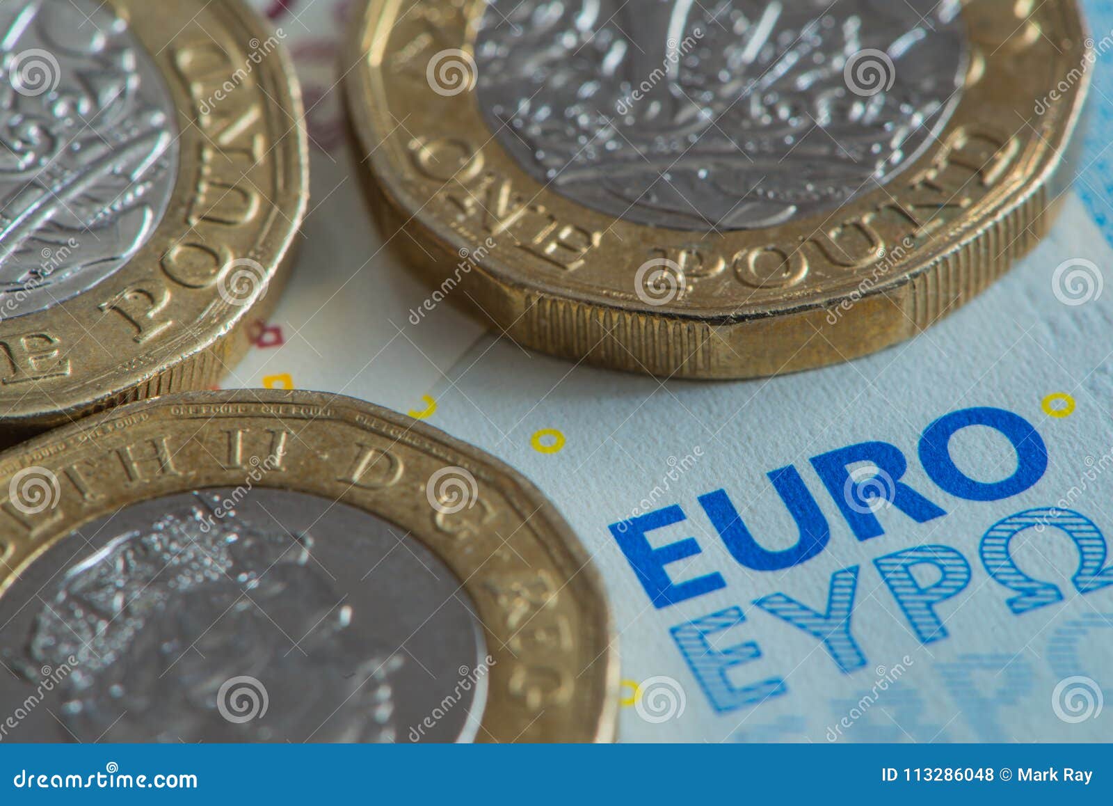 New British Pound Coins on Euro Banknote Editorial Stock Photo - Image ...