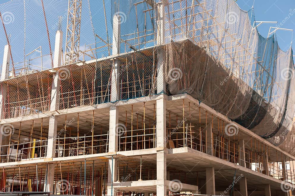 New Building Construction Process. Safety Nets and Structural Beams ...