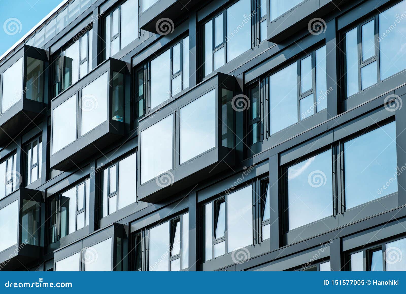 Facade With Windows On A Blue Building. A Single, Small Norwegian Flag ...