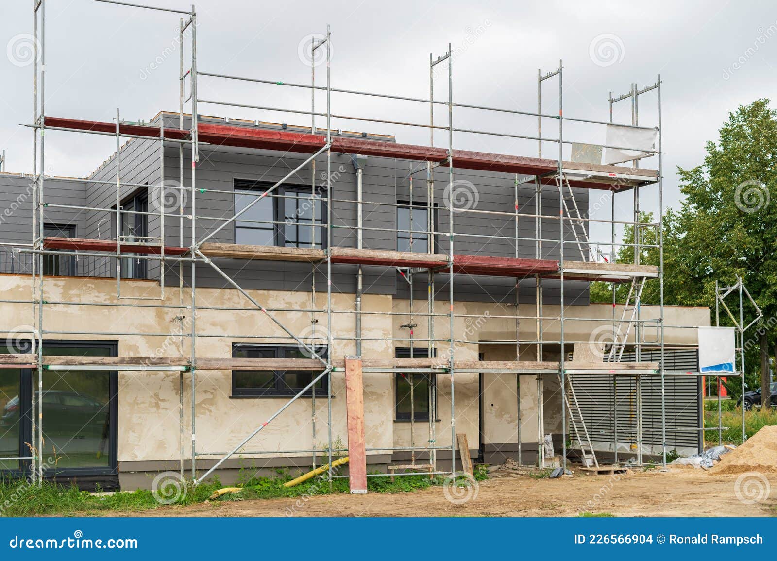 A New Building with Scaffolding Stock Photo - Image of savings ...