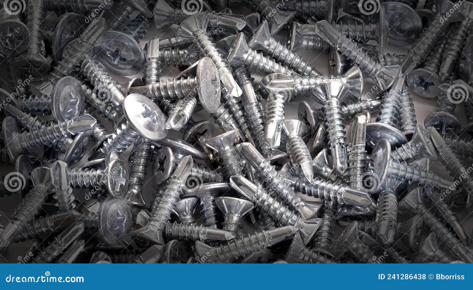 New Bunch of Small Metal Screws Sa Background Stock Photo - Image of ...