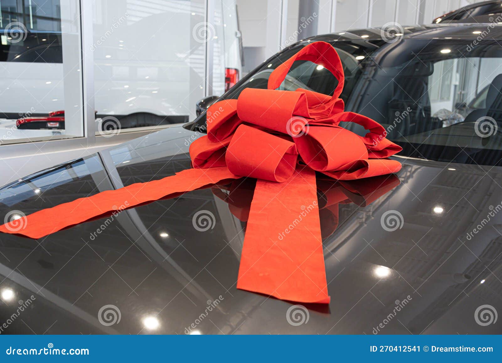 New Car Gift with a Red Bow Stock Image - Image of gift, present: 270412541