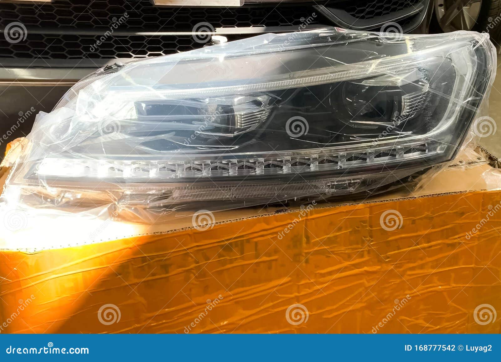 New Car Headlights, Replacement of Headlights on Car Stock Photo ...