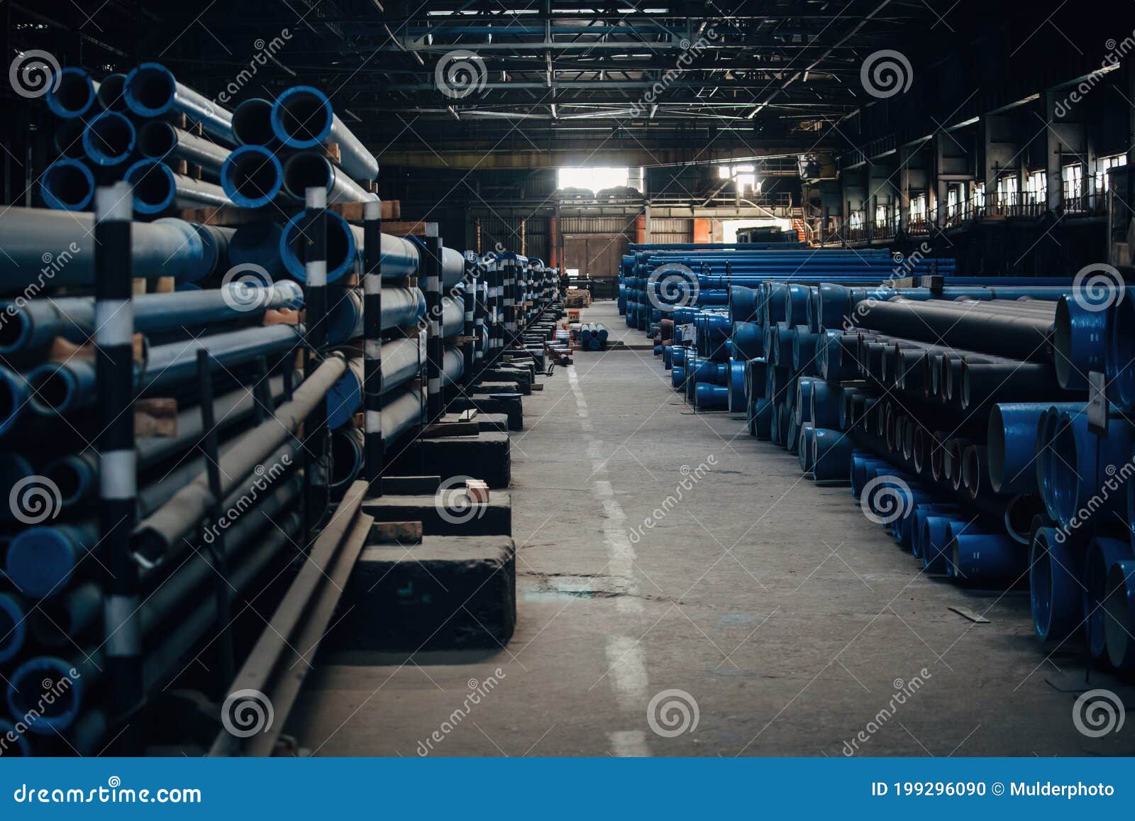 New Cast Iron Pipes for Pipeline Construction in Warehouse Stock Photo ...