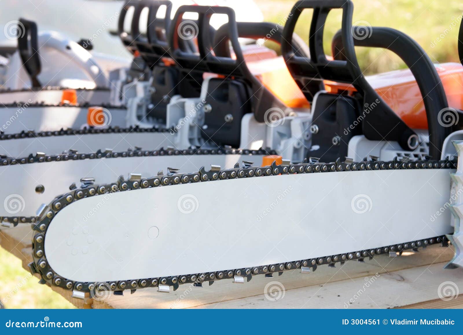 New chainsaws stock image. Image of lumberjack, power - 3004561