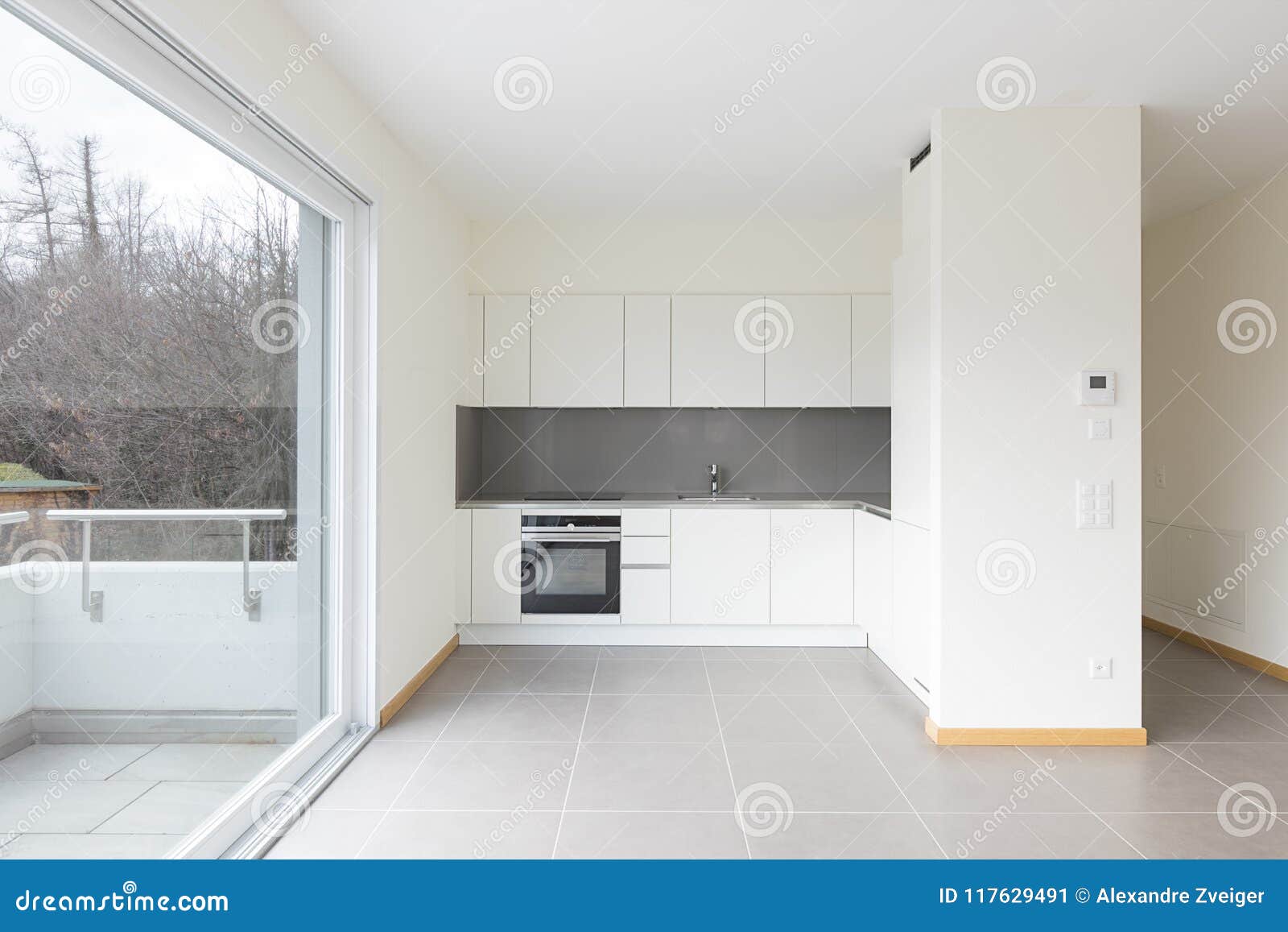 New, Clean and Empty Kitchen in the Empty Room Stock Image - Image of ...
