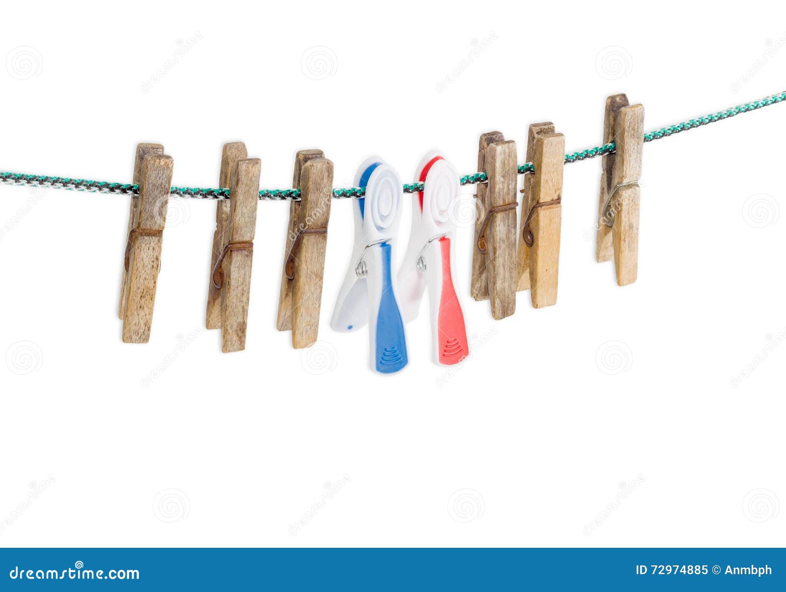 New Colored Plastic Clothespins among Old Wooden Clothespin Stock Image ...