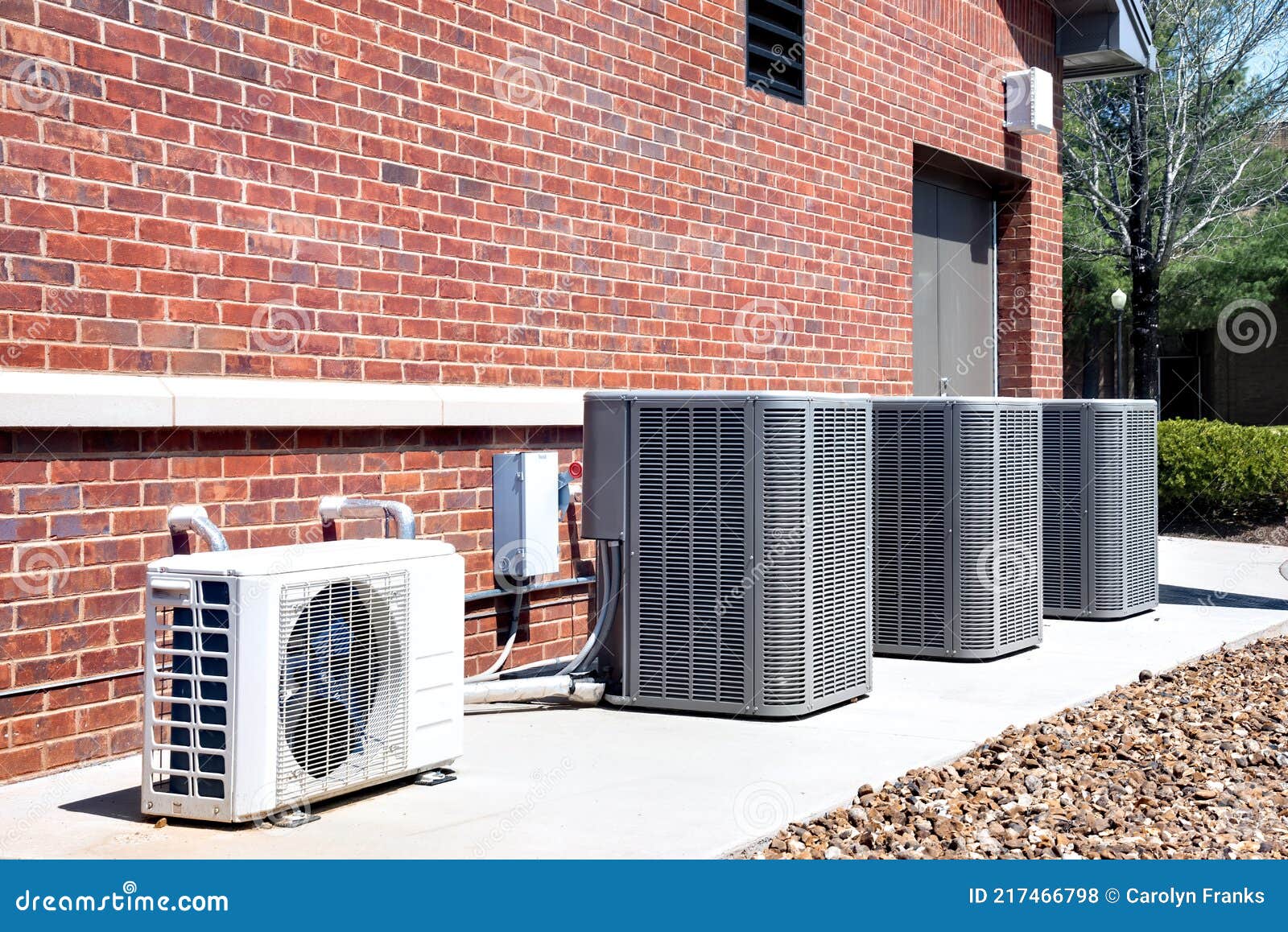 New Commercial Brick Structure with HVAC Units Stock Photo - Image of ...