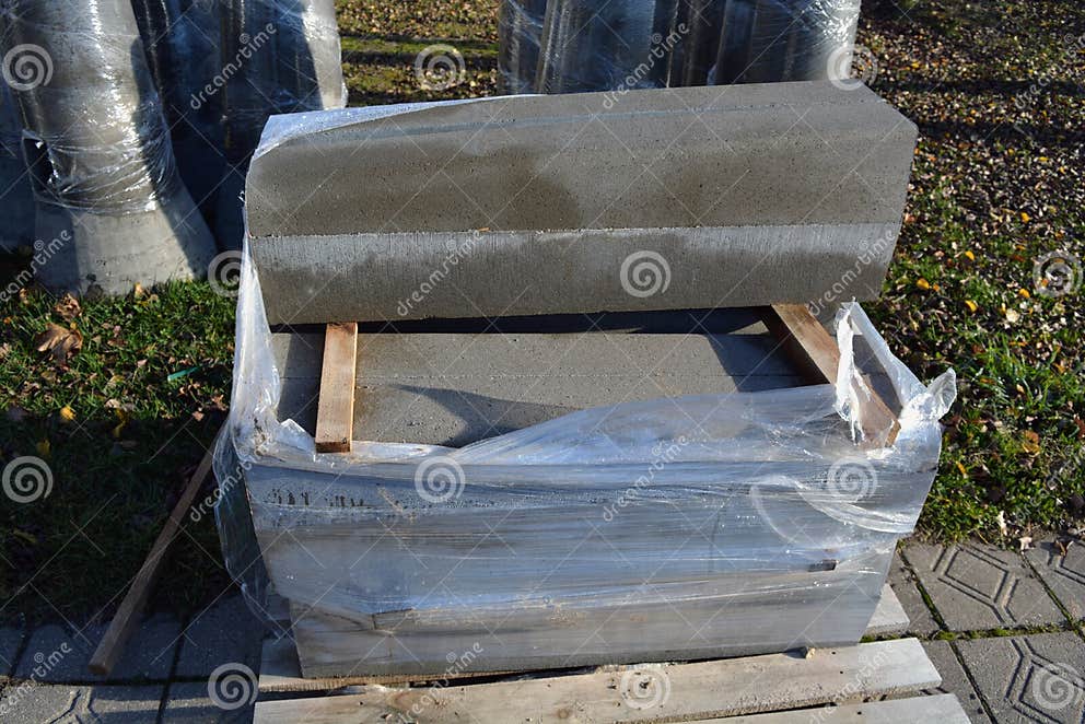 New Concrete Street Light Base and Pavement Edging Stack Stock Image ...