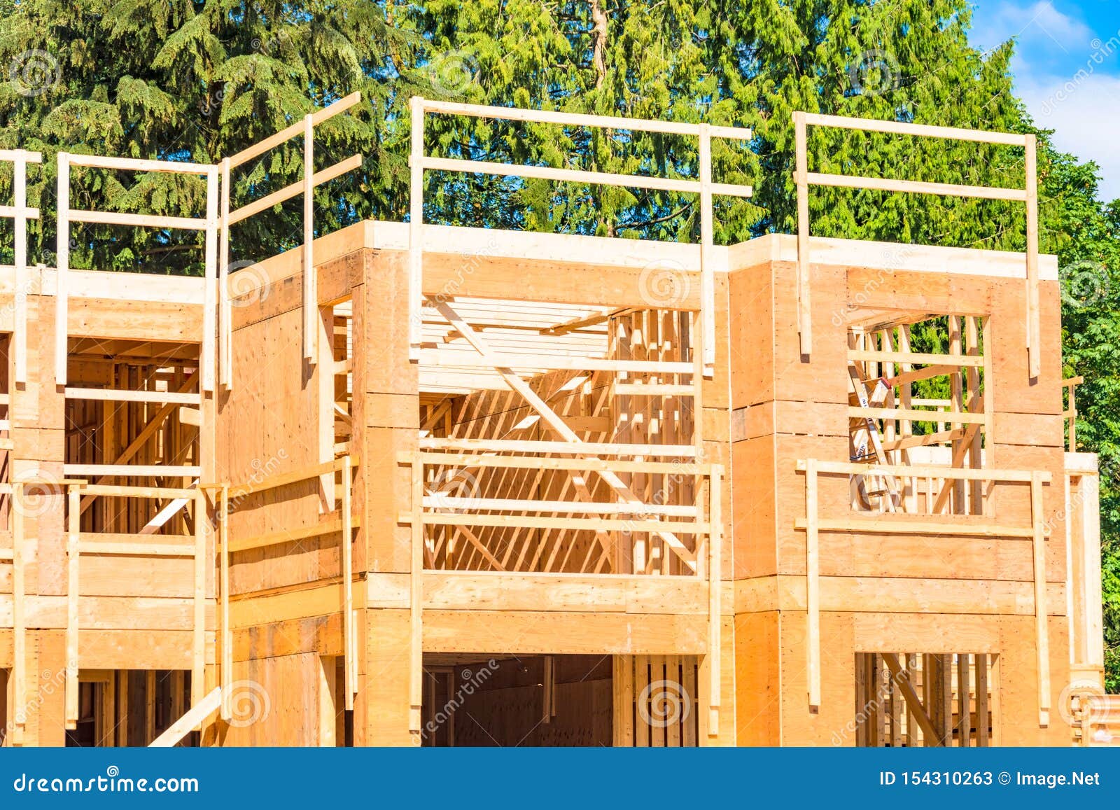 New Condo Building Under Construction on Green Trees Background Stock ...