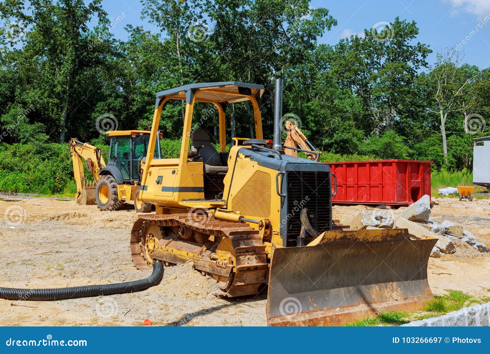 New Construction Tractor Excavators and Garbage Containers Stock Image ...
