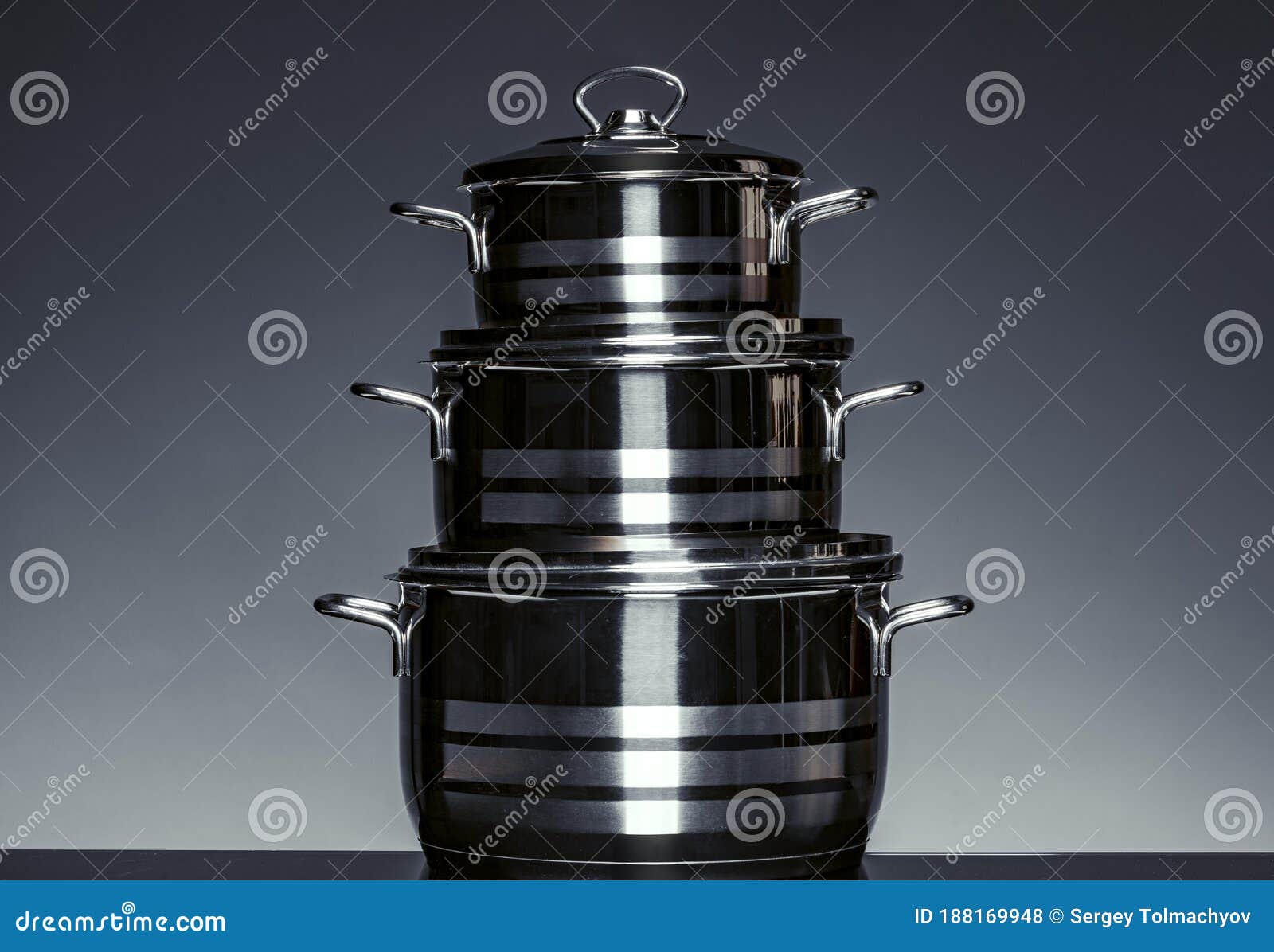 New Cookware on Black Background, Front View Stock Photo - Image of ...