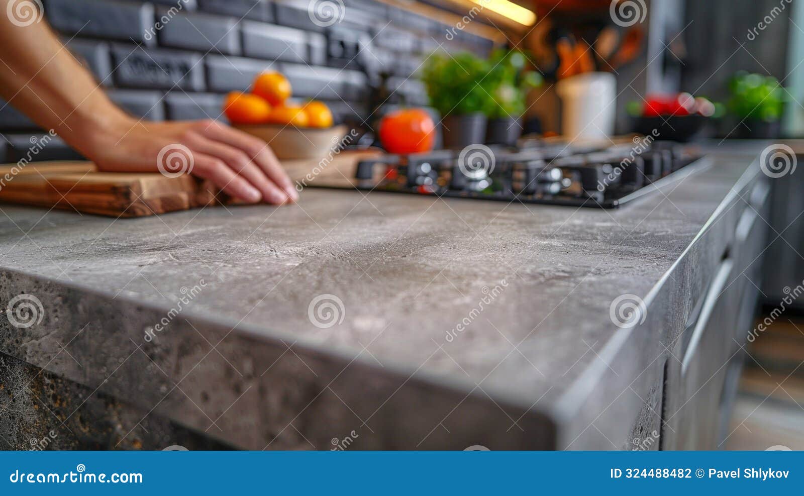 New Countertop is Installed in a Modern Kitchen. a Persons Hands are ...