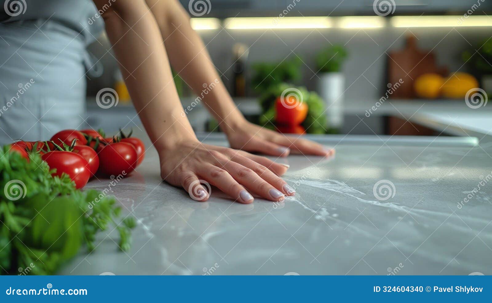 New Countertop is Installed in a Modern Kitchen. a Persons Hands are ...