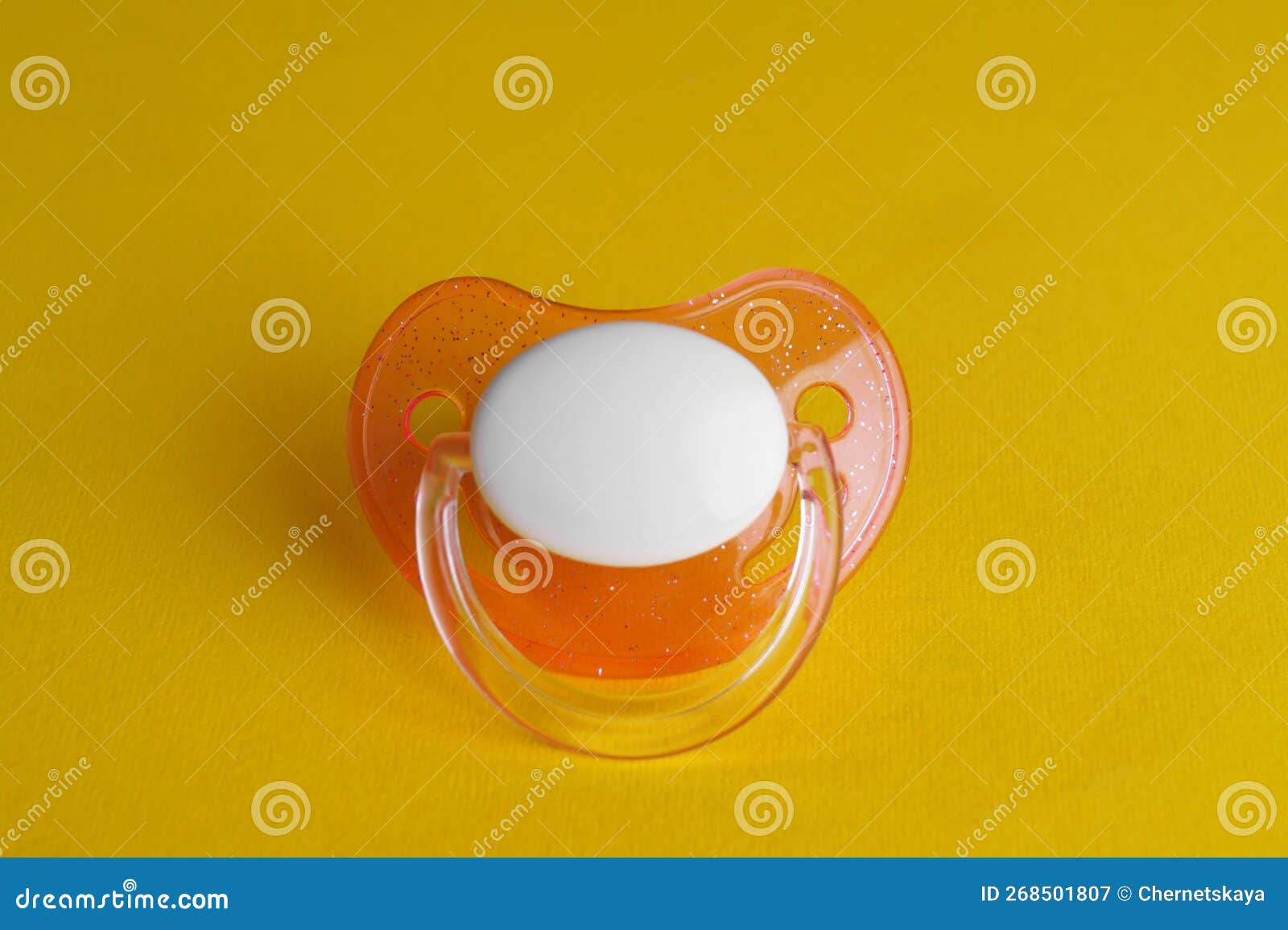 New Cute Baby Pacifier on Yellow Background Stock Image - Image of ...