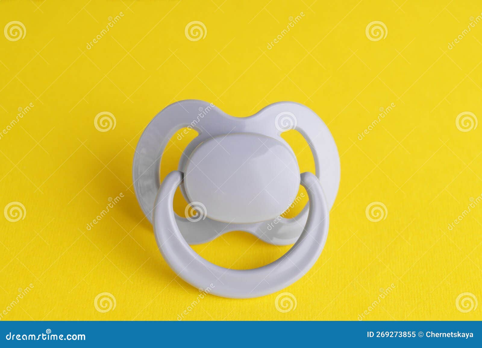 New Cute Baby Pacifier on Yellow Background Stock Image - Image of baby ...