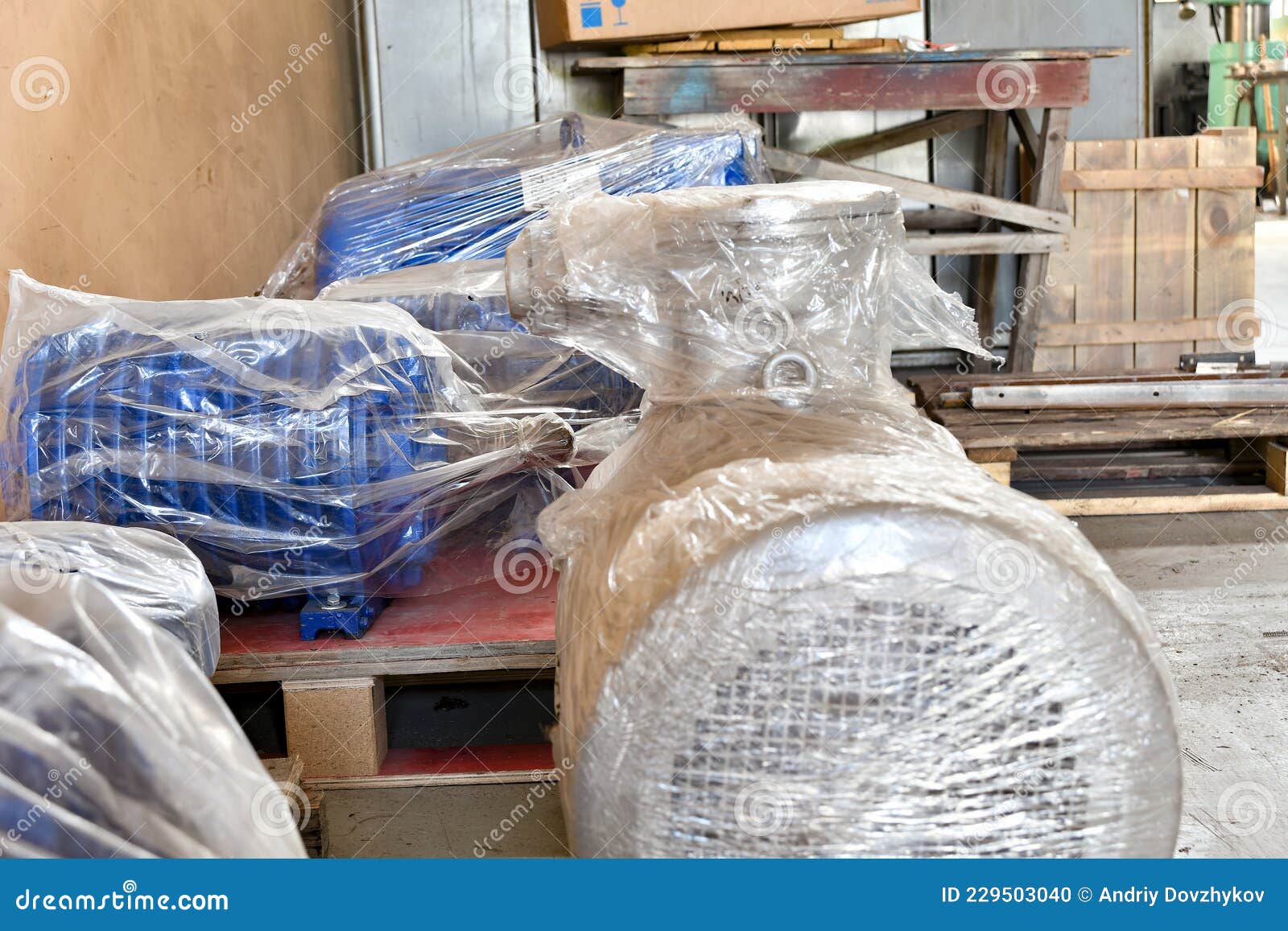 New Electric Motors are Wrapped with Packaging in the Warehouse Stock ...