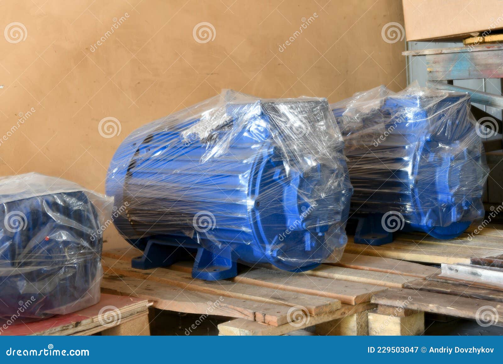 New Electric Motors are Wrapped with Packaging in the Warehouse Stock ...