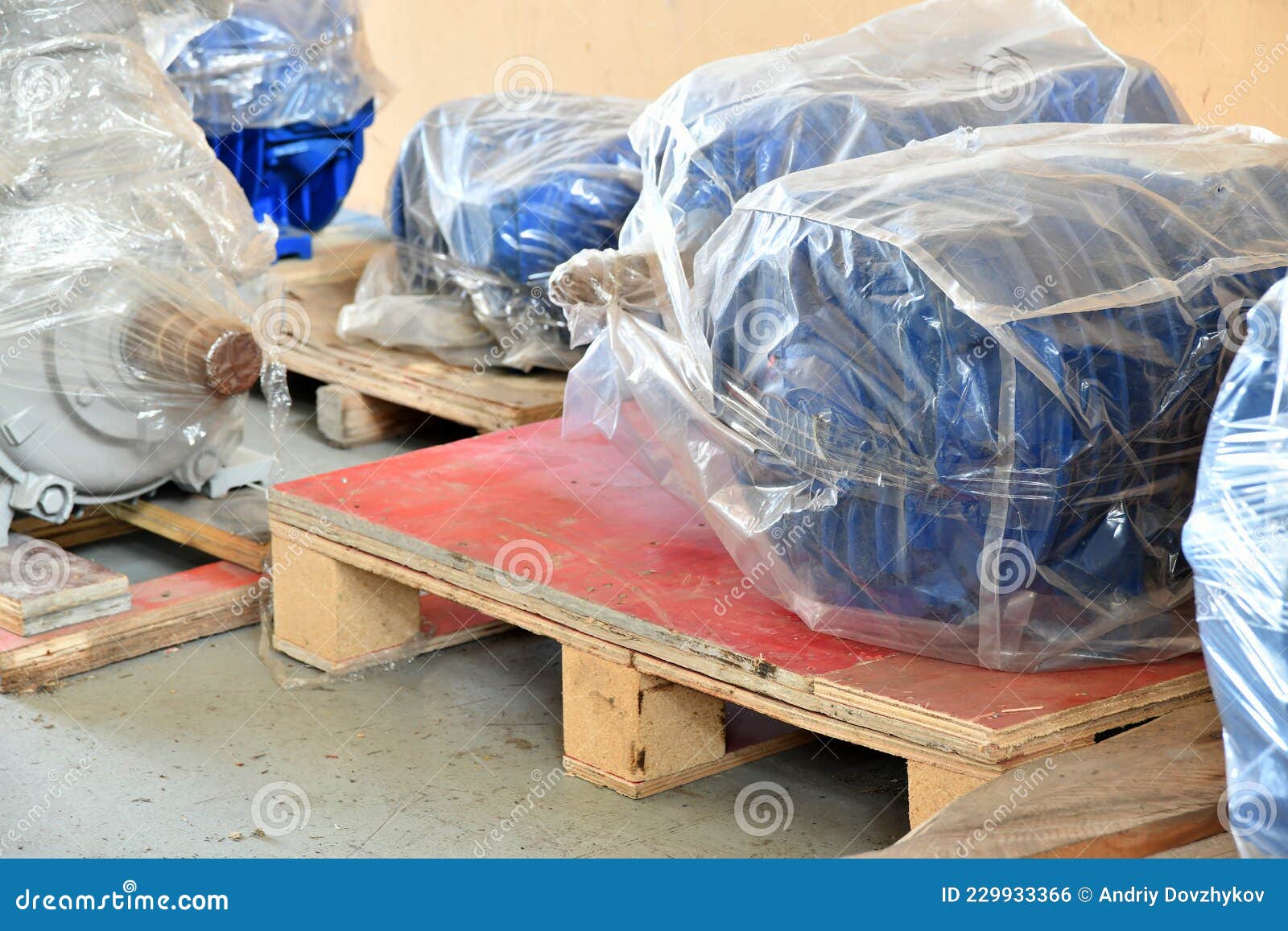New Electric Motors are Wrapped with Packaging in the Warehouse Stock ...