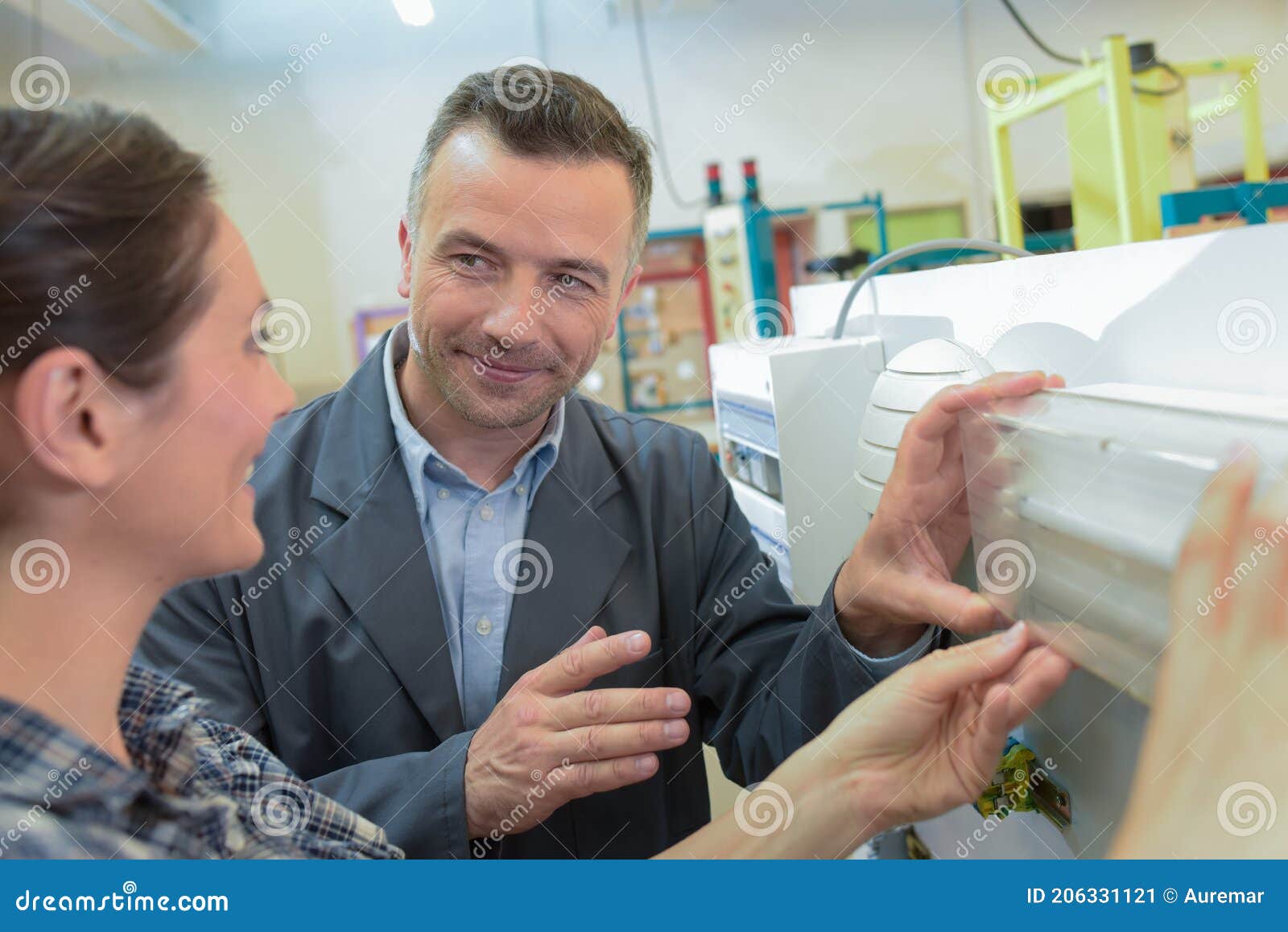 New Employee Learning To Use Equipment in Factory Stock Image - Image ...