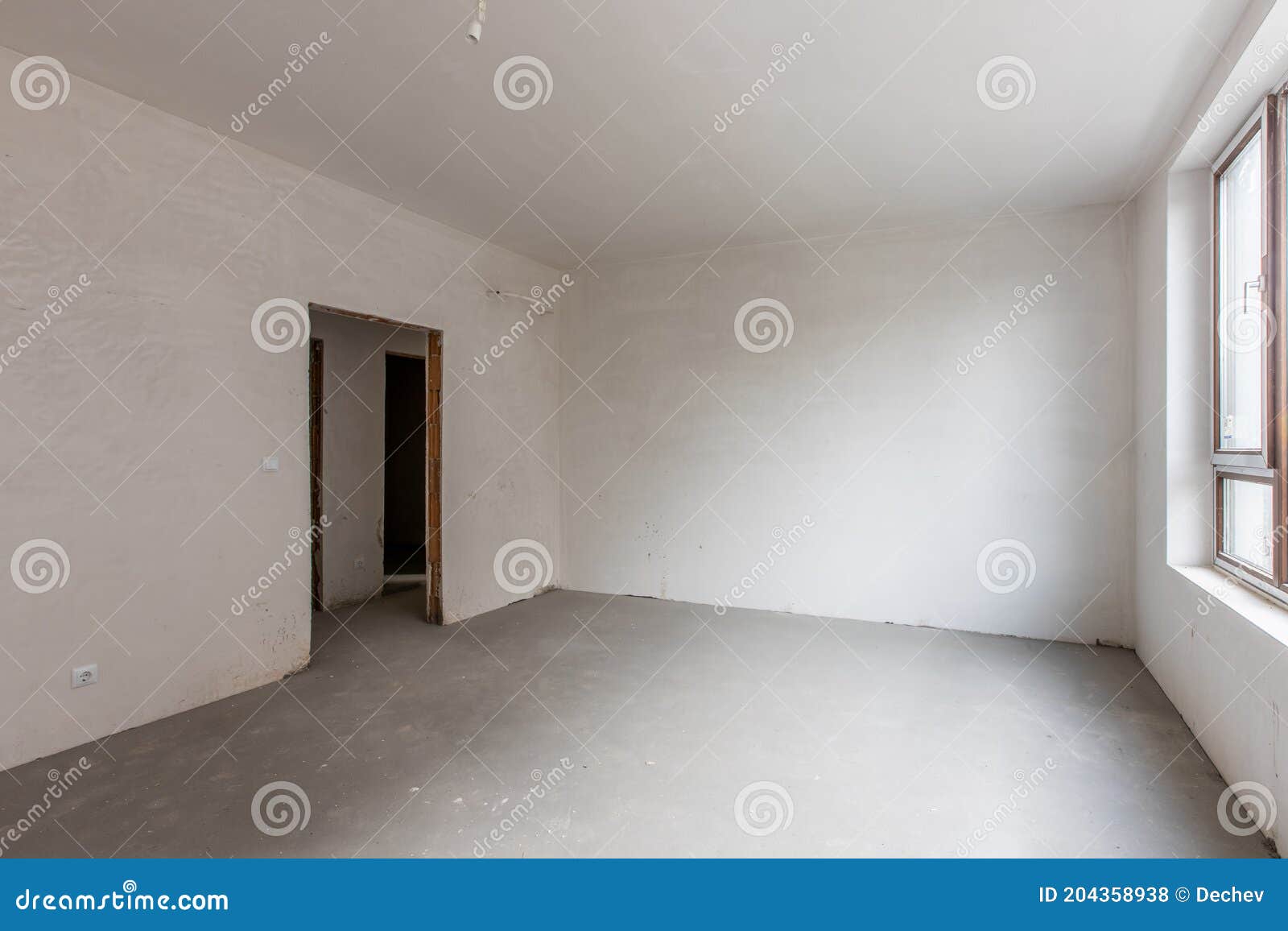 New Empty Room Under Construction. Plaster Walls. New Home. Concrete ...