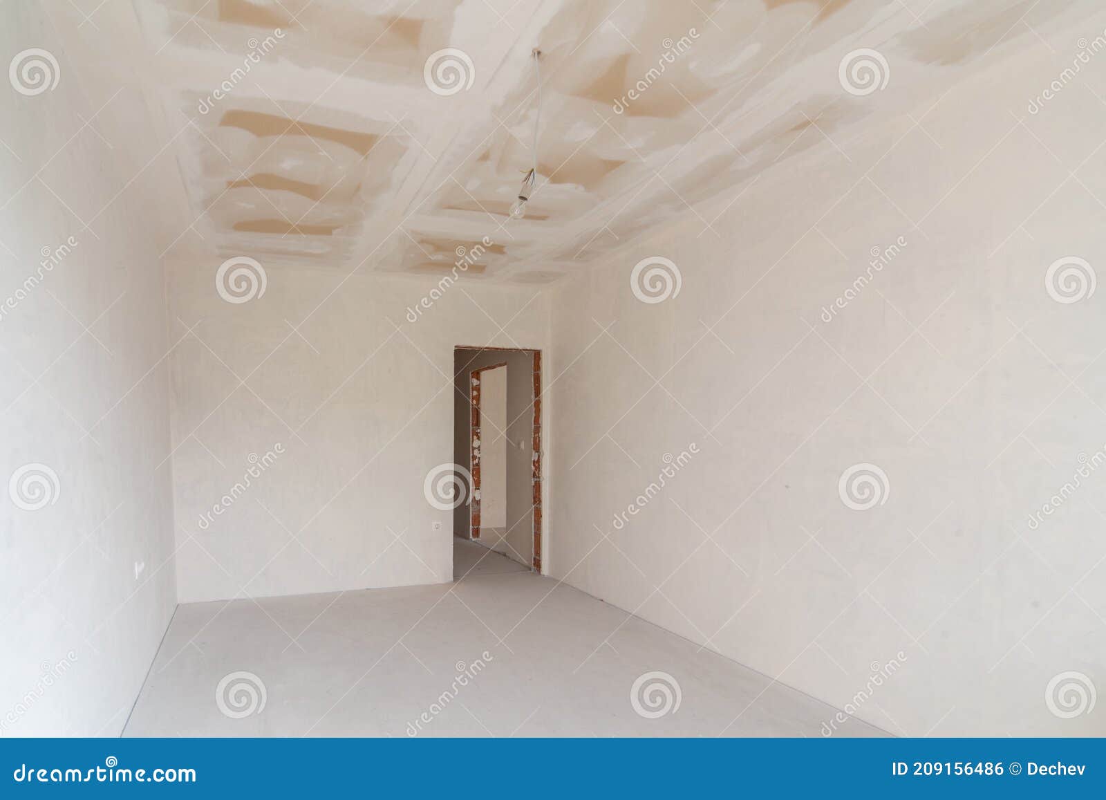 New Empty Room Under Construction. Plaster Walls. New Home. Concrete ...