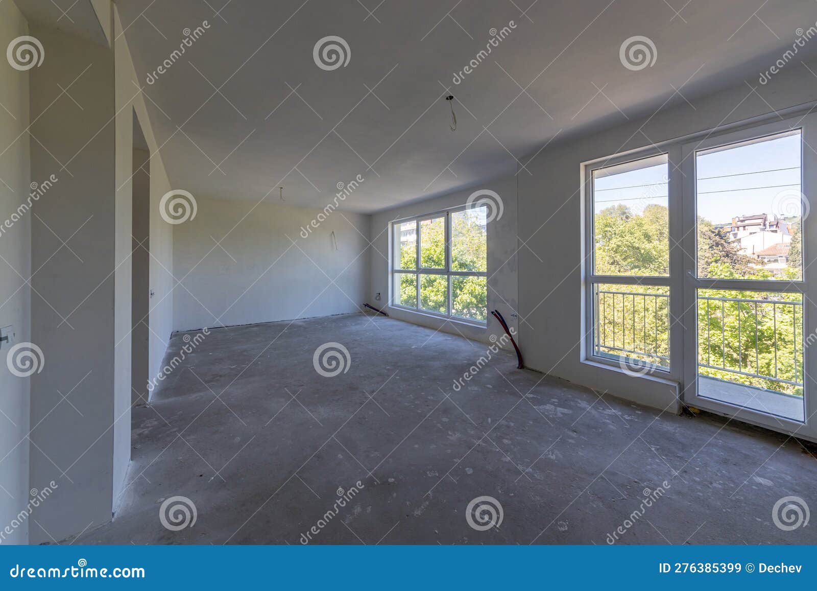 New Empty Room Under Construction. Plaster Walls. New Home. Concrete ...