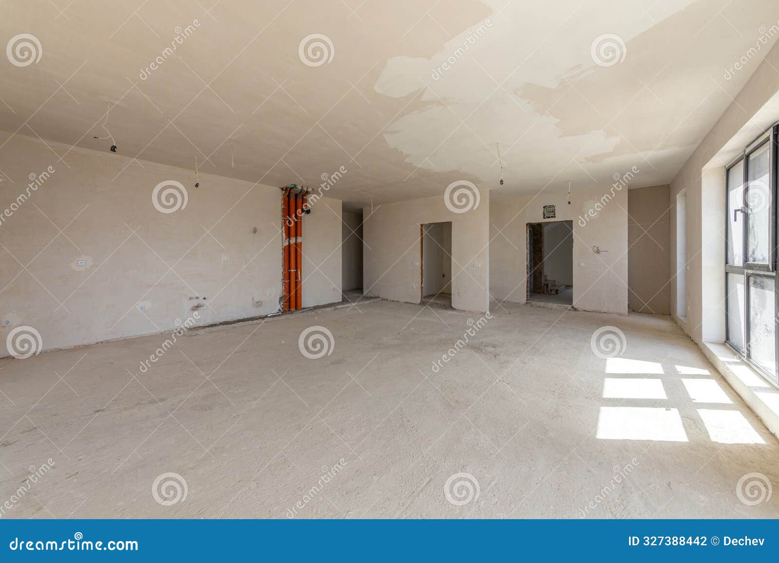 New Empty Room Under Construction. Plaster Walls. New Home. Concrete ...
