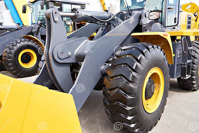 New front loader trucks stock image. Image of scoop - 255345063