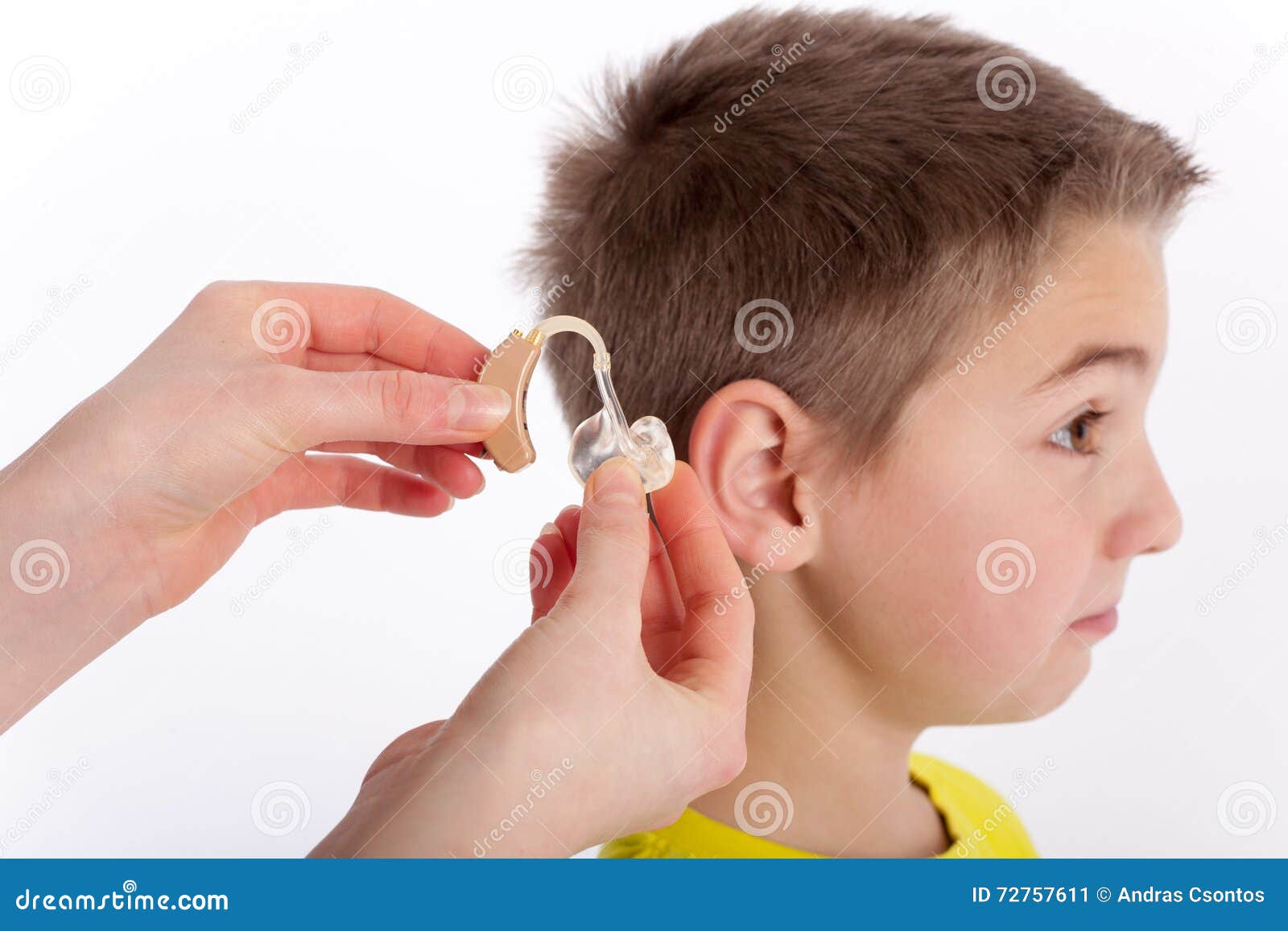New Hearing Aid for a Young Boy Stock Image - Image of doctor, cute ...